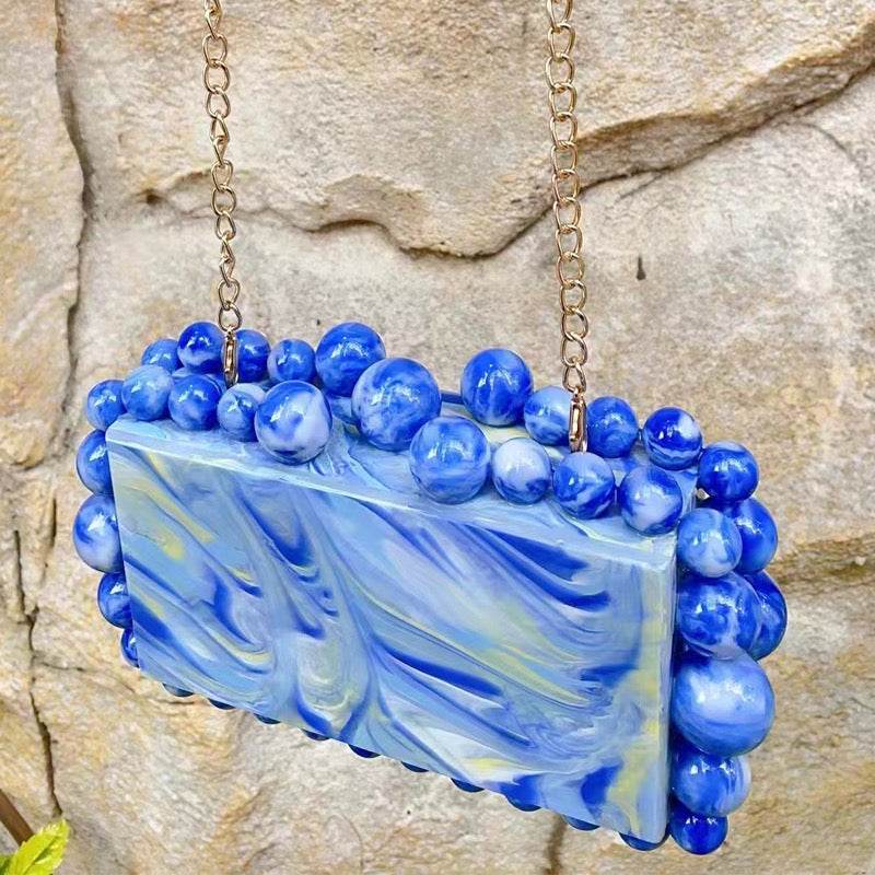 Yendi Sapphire Clutch Yendi Sapphire Clutch with Tortoise Acrylic ...